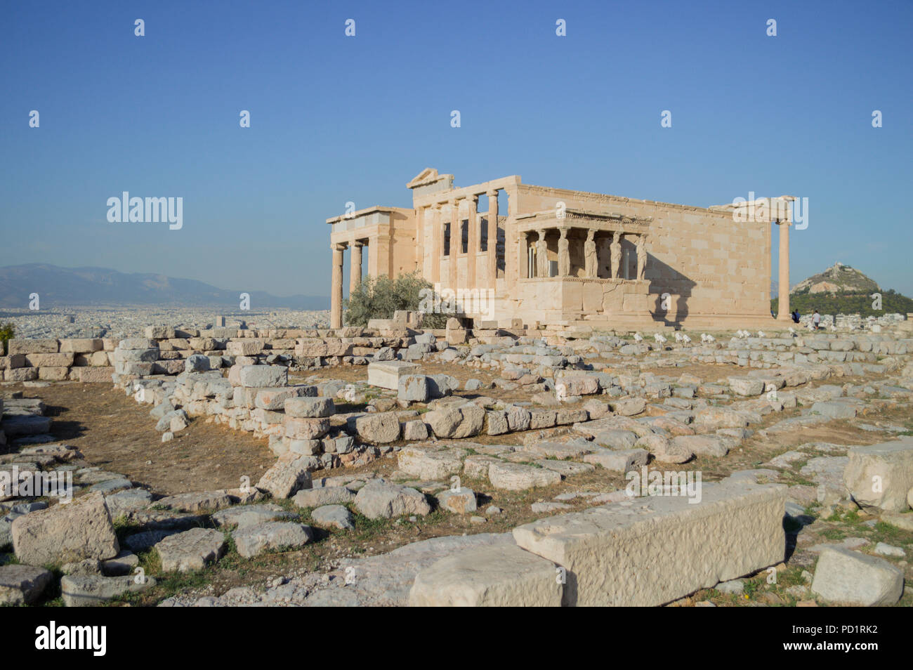 Ruin of a Temple at the Acropolis with Athens Backdrop, Greece Stock ...