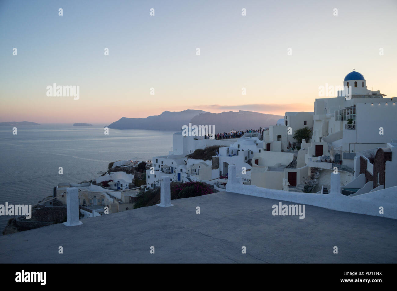 Whitewashed Houses and Church on Cliffs with Sea View and Sunset in Oia ...
