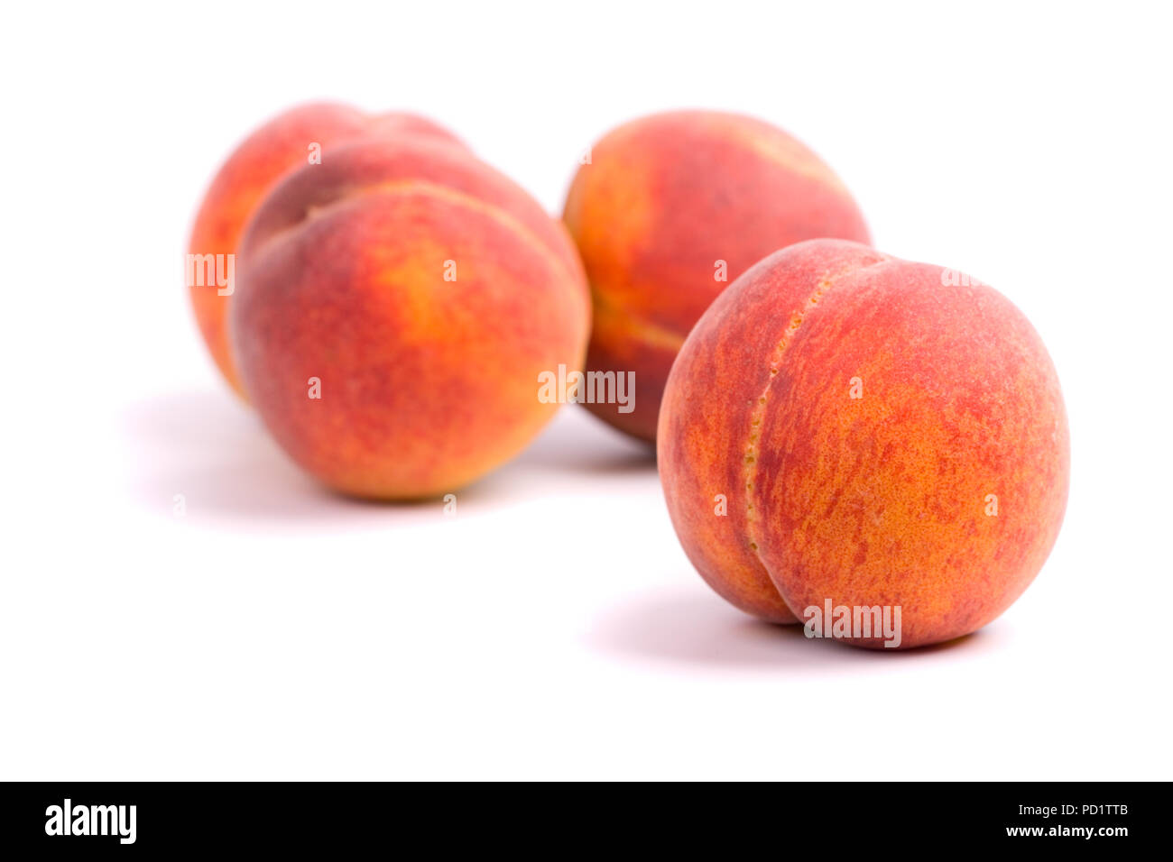 Four peaches on white hi-res stock photography and images - Alamy