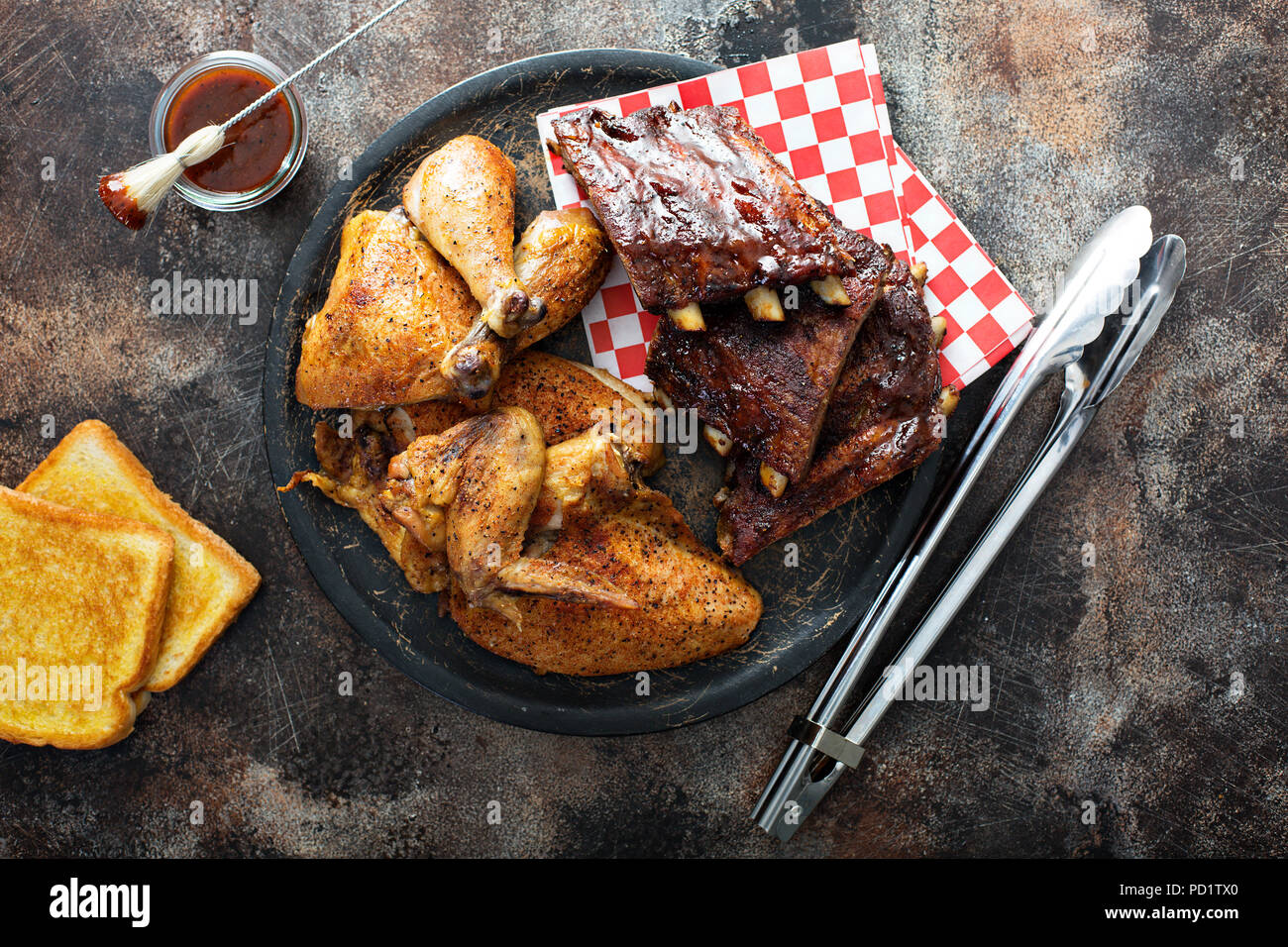 Grilled or smoked ribs and chicken Stock Photo - Alamy