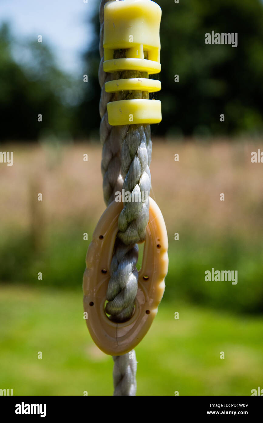 Friction rope clamp in plastic with artificial fibre rope. Plastics ...