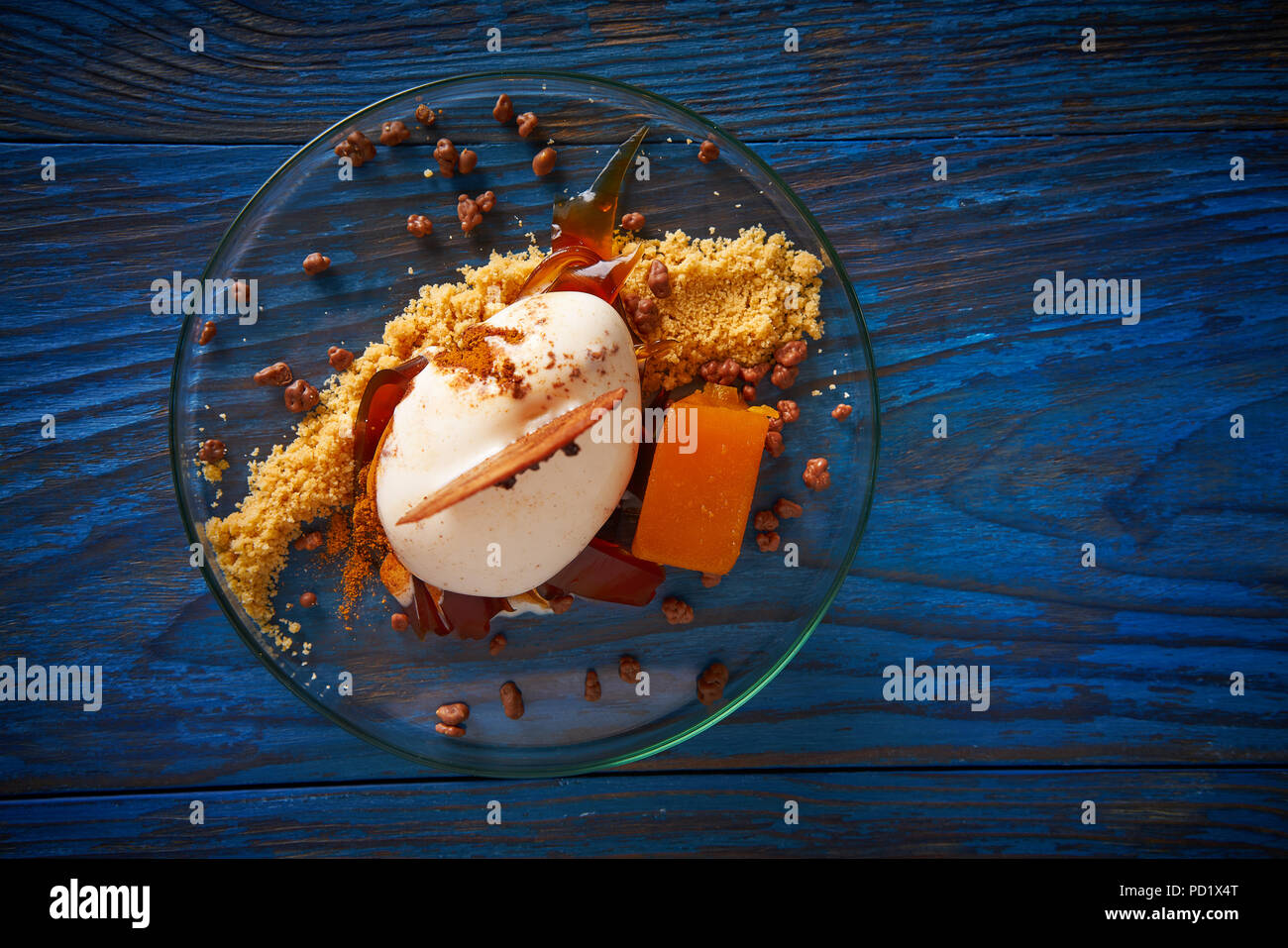Modern cuisine ice cream dessert with quince vanilla and crunchy Stock ...