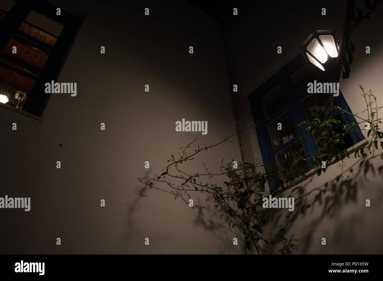Typical Whitewashed Houses and Alley in Plaka at Night, Milos, Greece ...
