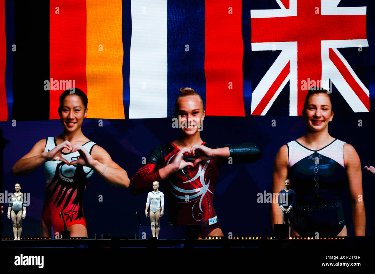 l-r; Germany's Kim Bui, Russia's Angelina Melnikova and Great Britain's ...