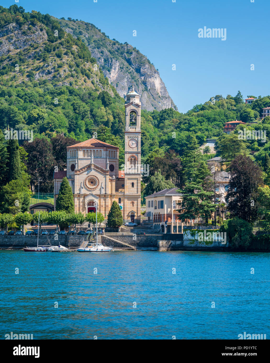 Scenic view in Tremezzo, with San Lorenzo Church overlooking Lake Como ...