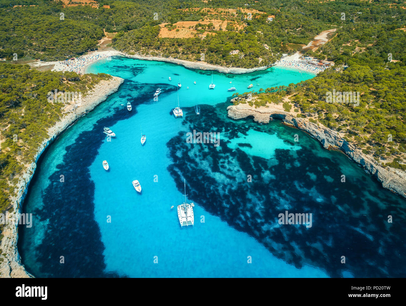 Aerial view of boats, luxury yachts and transparent sea at sunny day in ...