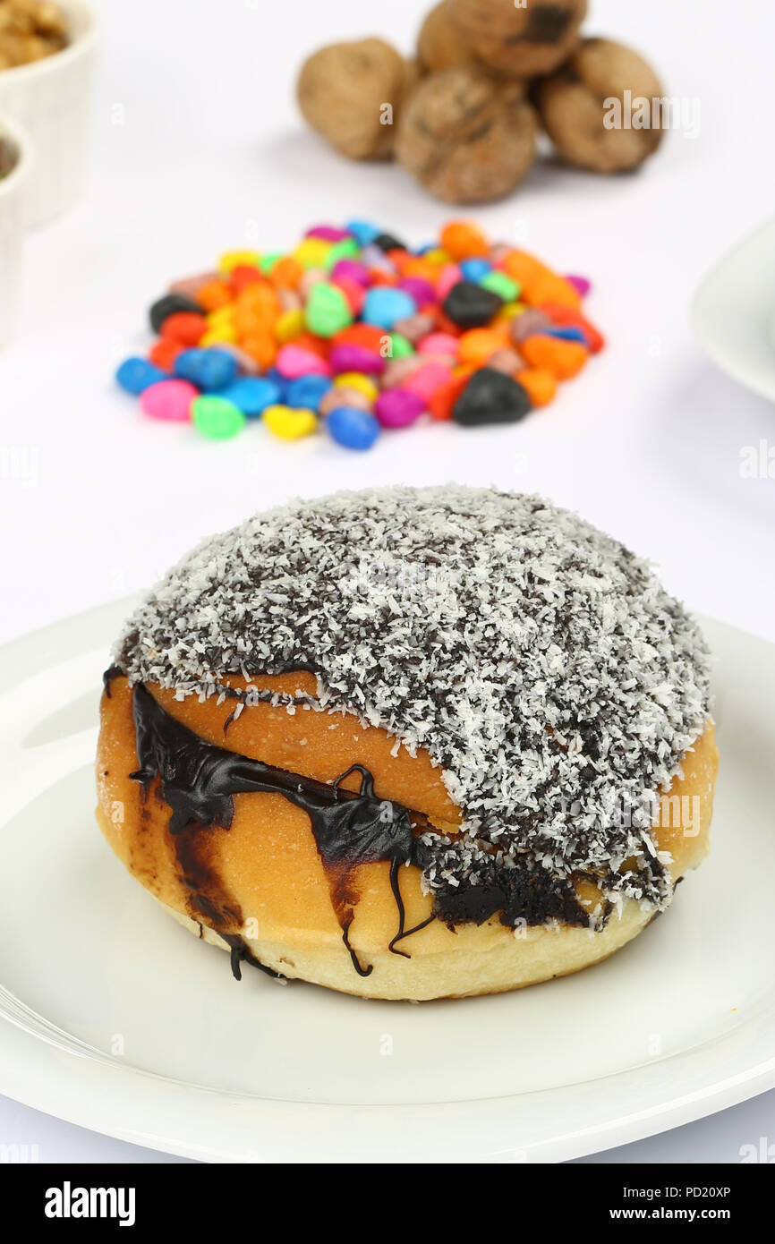 Chocolate Donut and Powdered Sugar Stock Photo - Alamy