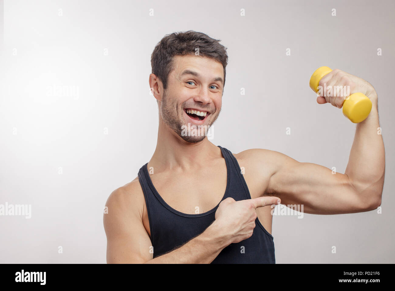 Handsome muscular man pointing healthy hi-res stock photography and ...