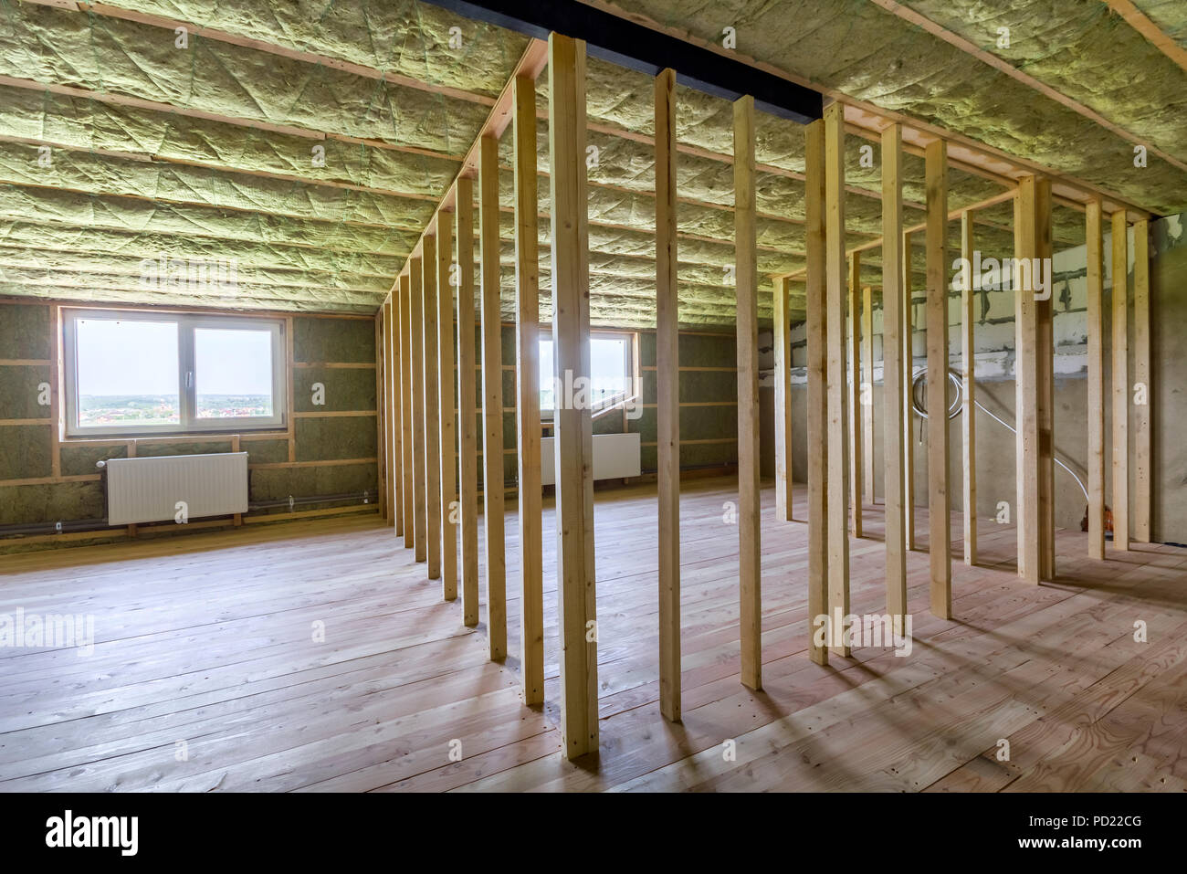Construction and renovation of big light spacious empty room with oak ...