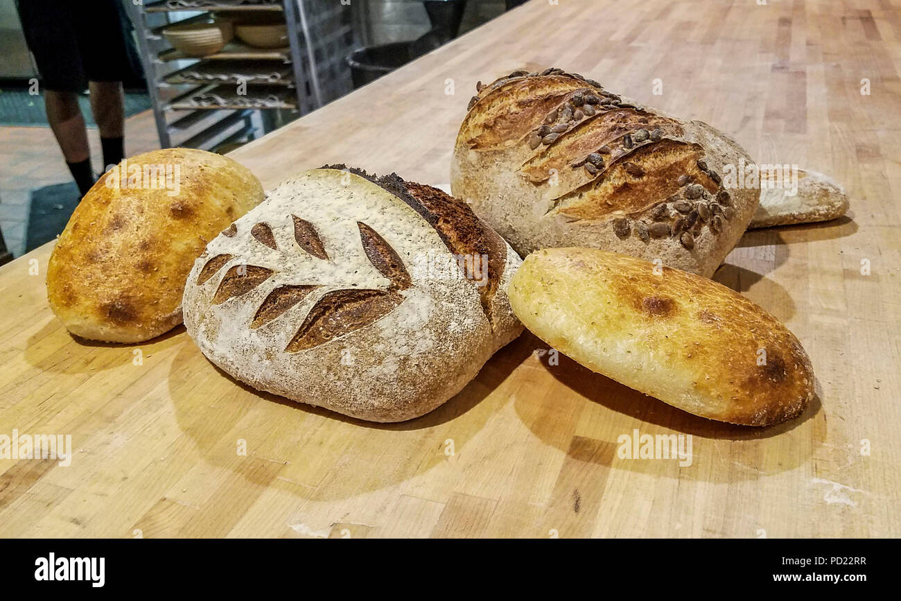 Assortment of gourmet, fresh baked loaves of bread at Bleu Handcrafted ...