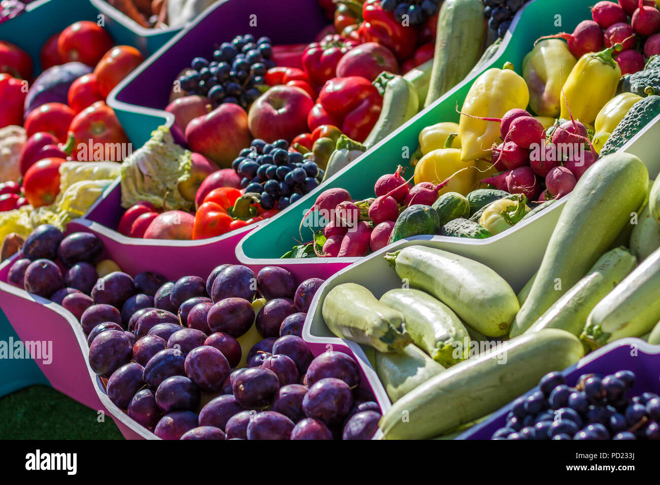Farmers fruit market with various colorful fresh fruits and vegetables ...