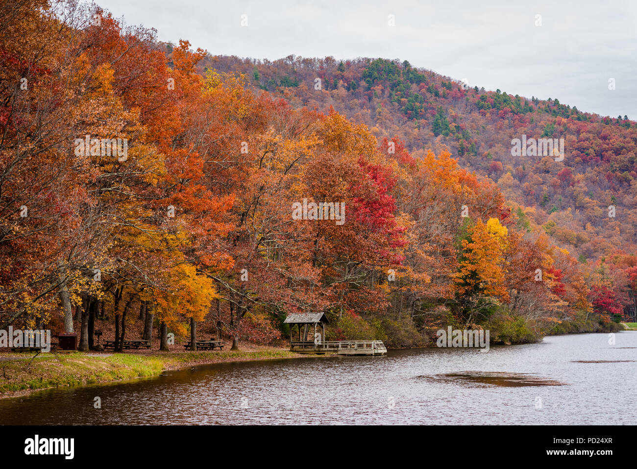 Autumn color at Sherando Lake, near the Blue Ridge Parkway in George ...