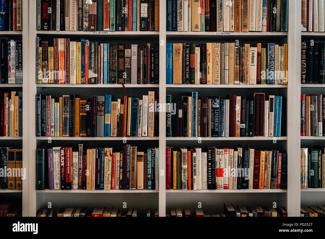 Books on shelves in a book store Stock Photo - Alamy