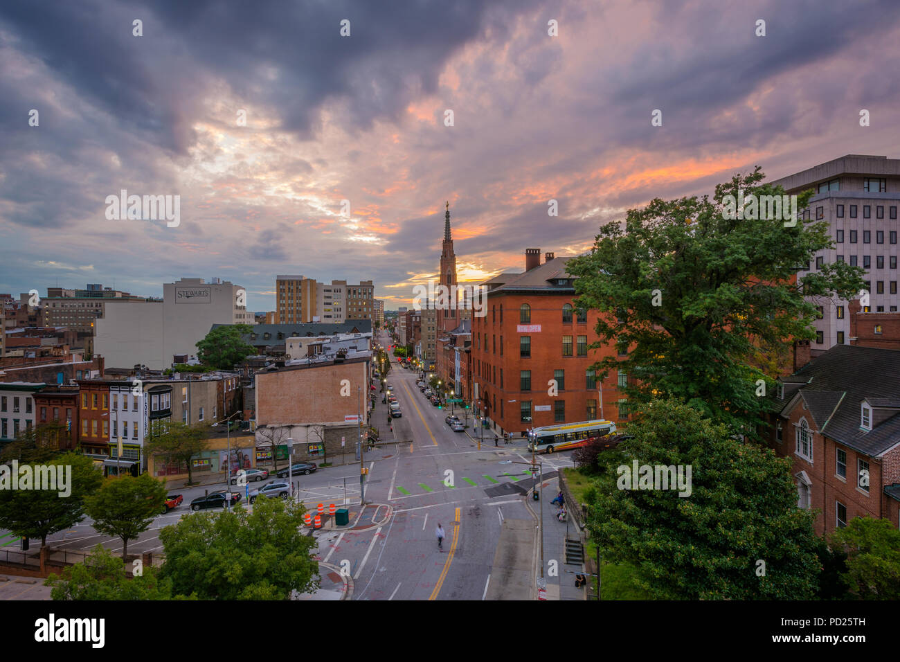 Saratoga Street at sunset, in downtown Baltimore, Maryland Stock Photo ...