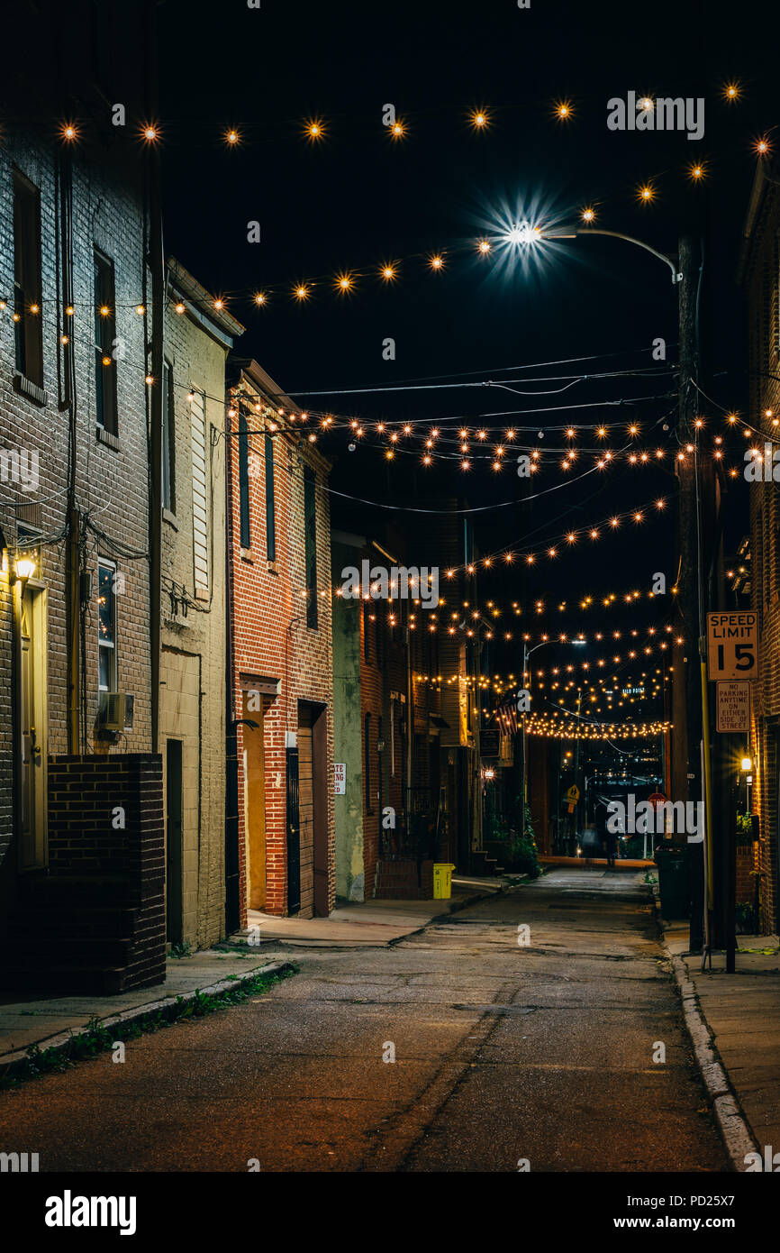 String lights over Chapel Street at night in Butchers Hill, Baltimore ...