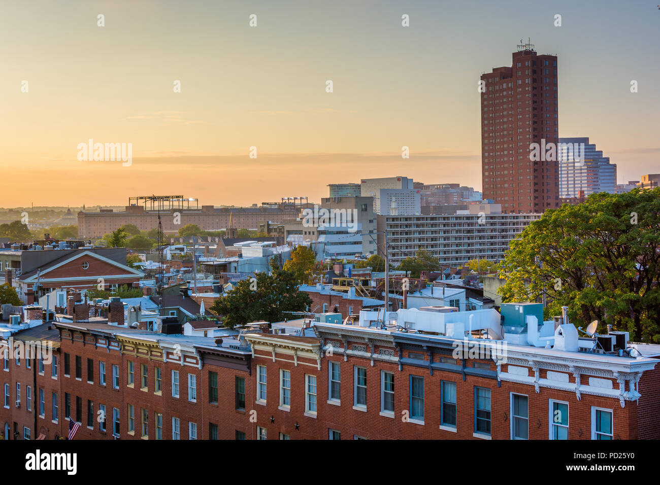 Sunset view of Federal Hill row houses and downtown, in Baltimore ...
