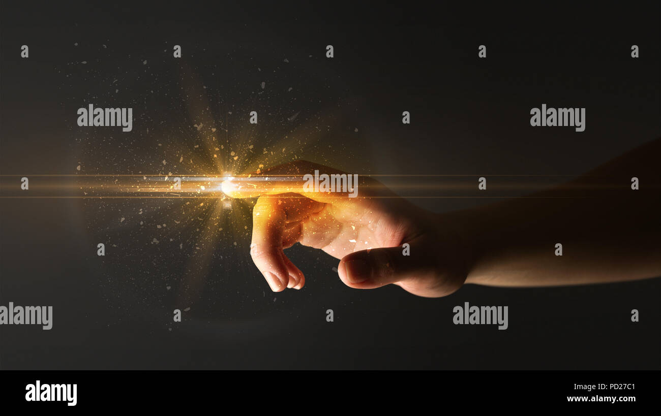 Female finger touching a beam of light Stock Photo - Alamy
