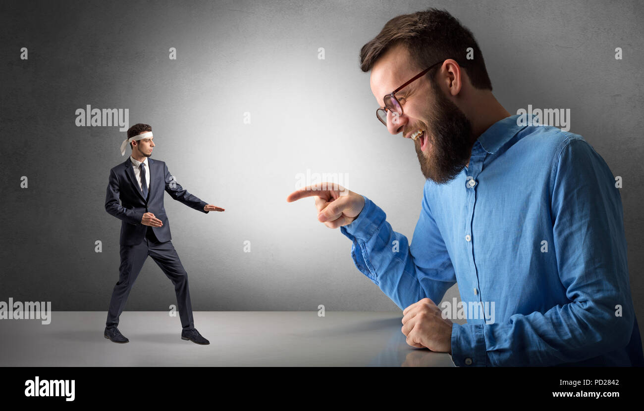 Giant hipster man yelling at a small karate man Stock Photo - Alamy