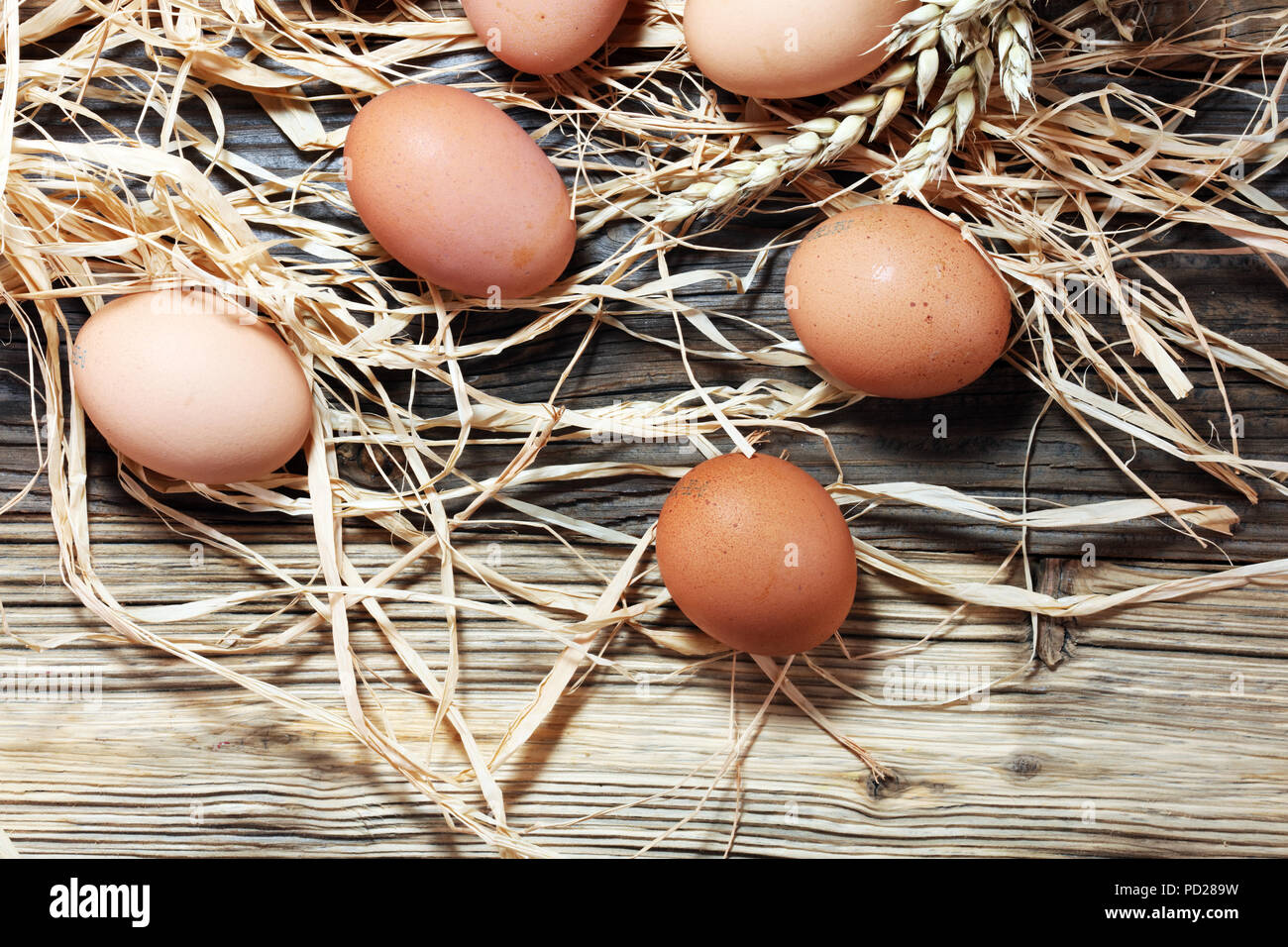 Egg. Fresh farm eggs on a wooden rustic background Stock Photo - Alamy
