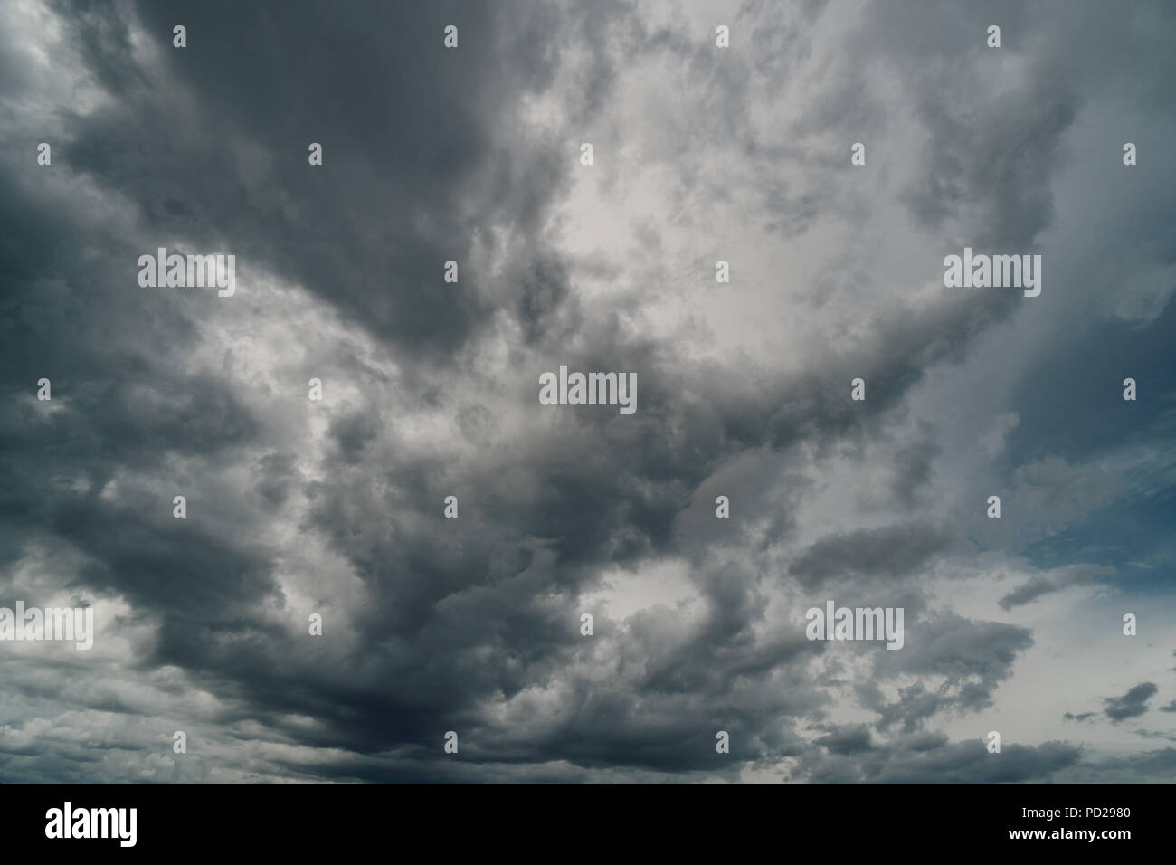 Dramatic thunder storm clouds at dark sky Stock Photo - Alamy