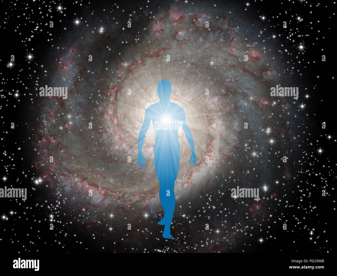 Figure emerges from the cosmos Stock Photo - Alamy