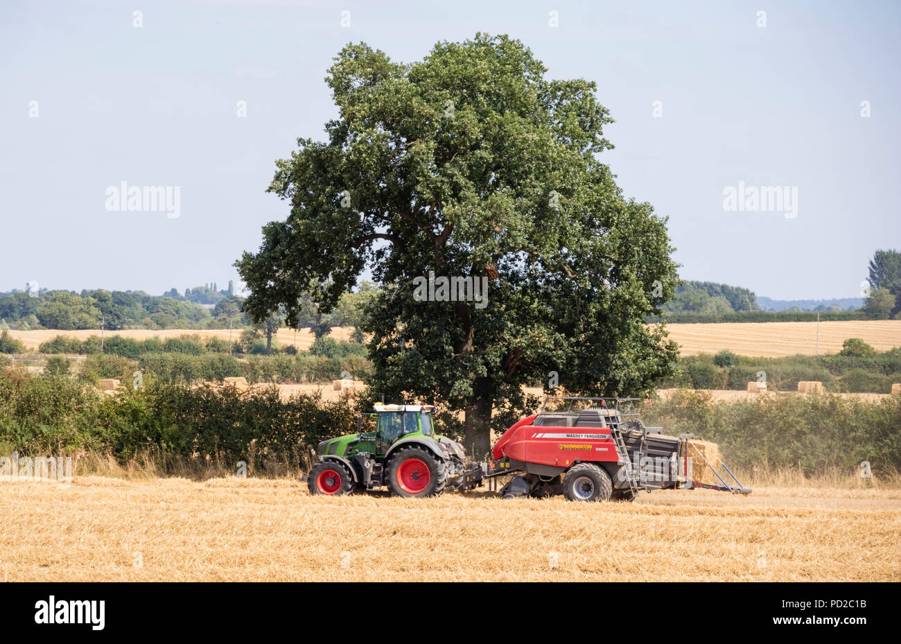 Hay bailing on an English farm, England, UK Stock Photo - Alamy