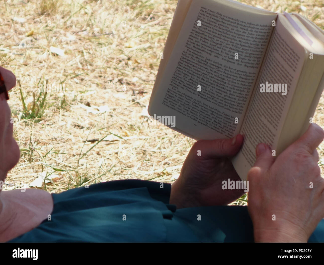 Chill girl reading book in hi-res stock photography and images - Alamy