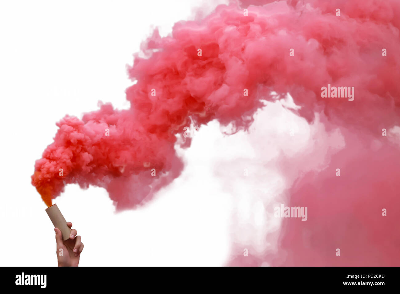Human hand holding smoke bombs with red smoke, isolated on white ...