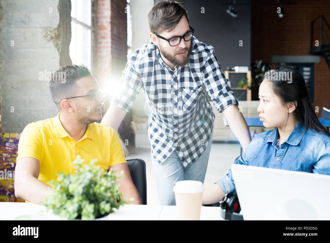 Creative Business Team Discussing Plan in Office Stock Photo - Alamy