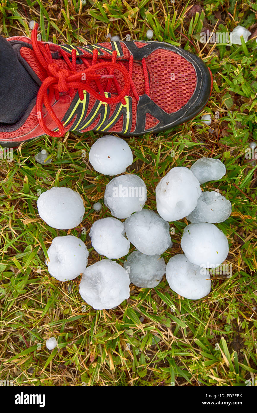 Hailstones from a thunderstorm over Chabanais, France, that turned the ...