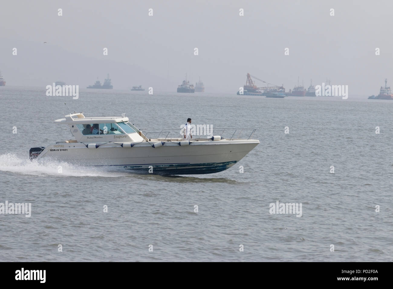 Gateway of India and Hotel Taj Mahal Palace and Mumbai skyline with ...