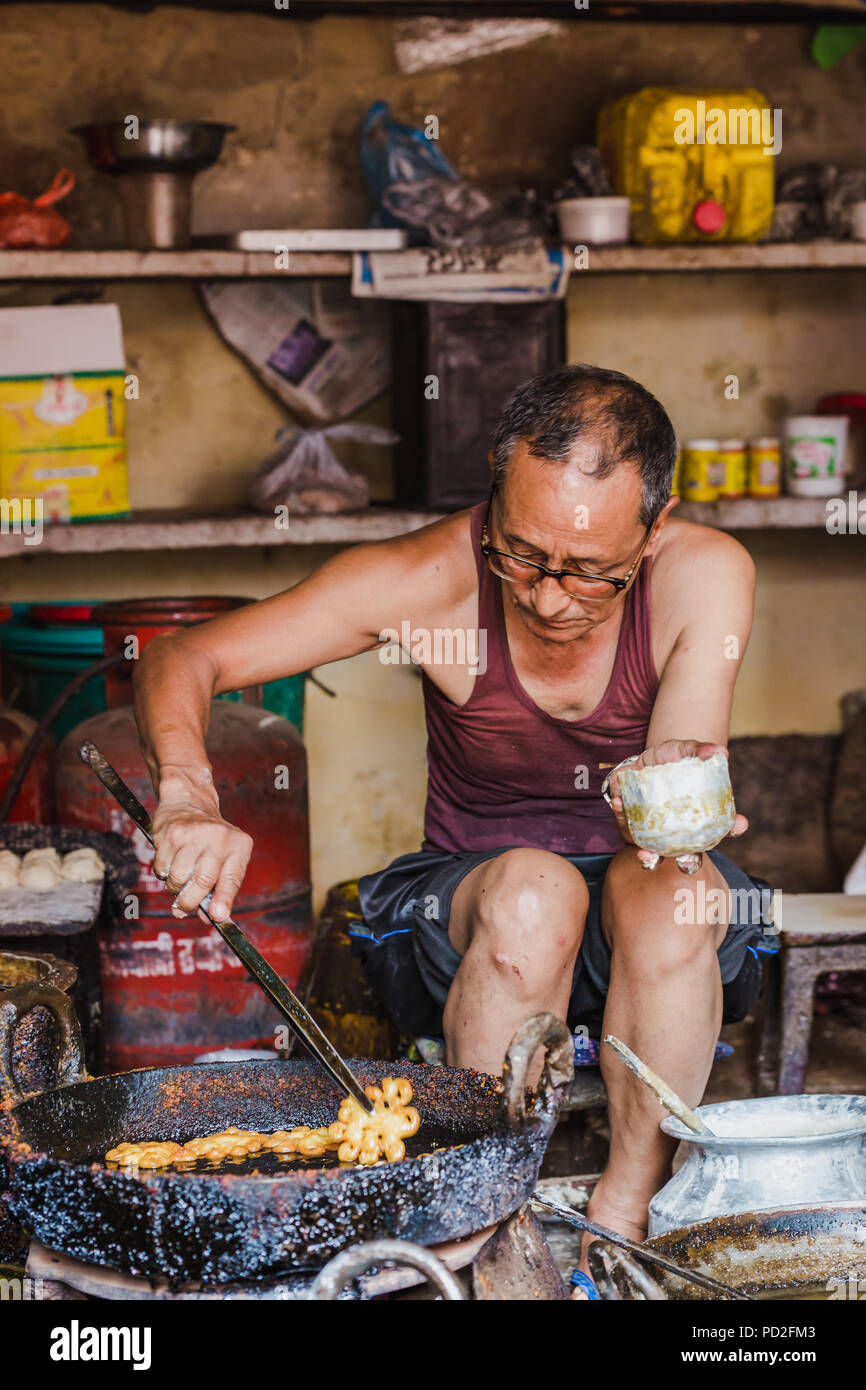 Bhaktapur,Nepal - August 4,2018 : Man Cooking Hot Jerri,Traditional ...