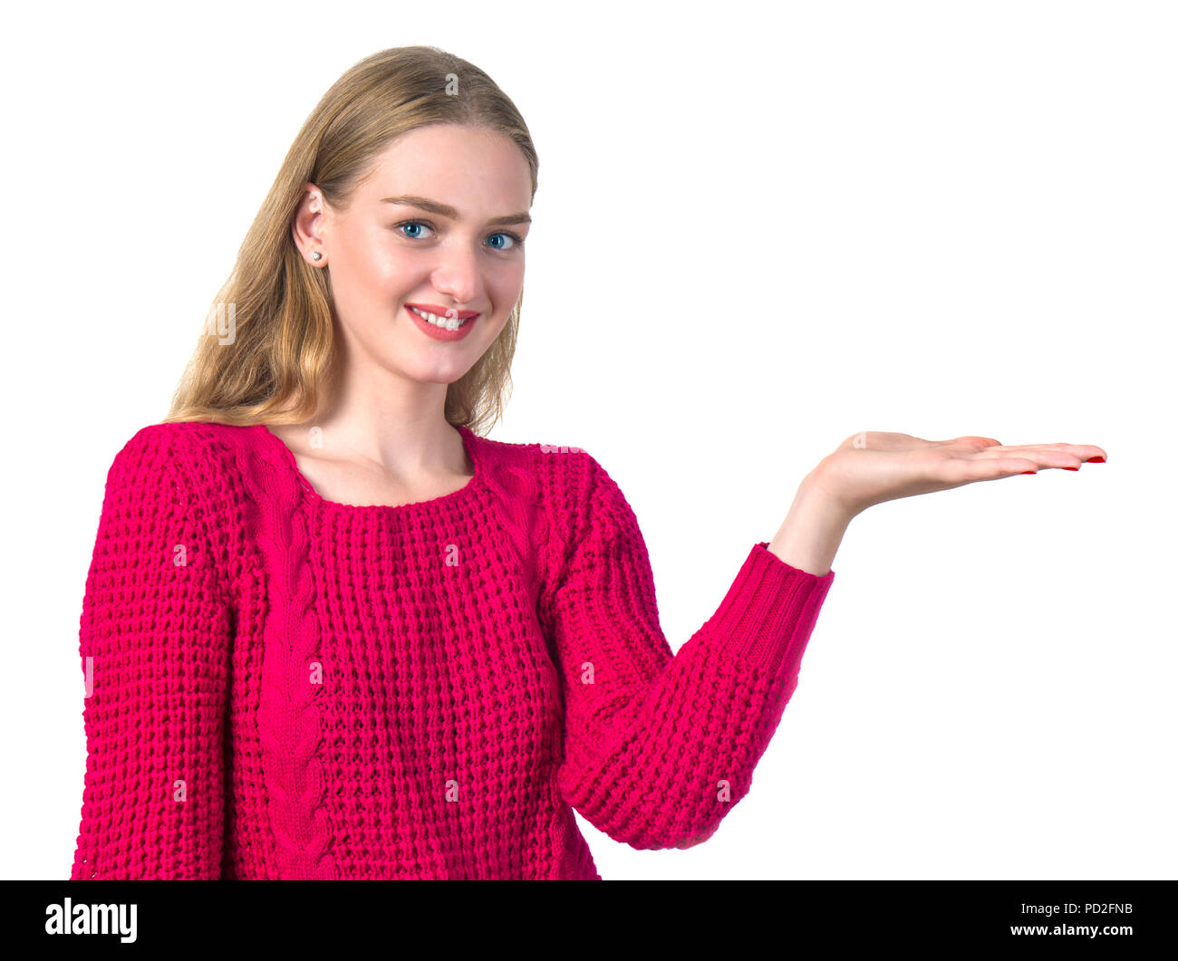 Beautiful blonde girl holding out her hand holding something Stock ...