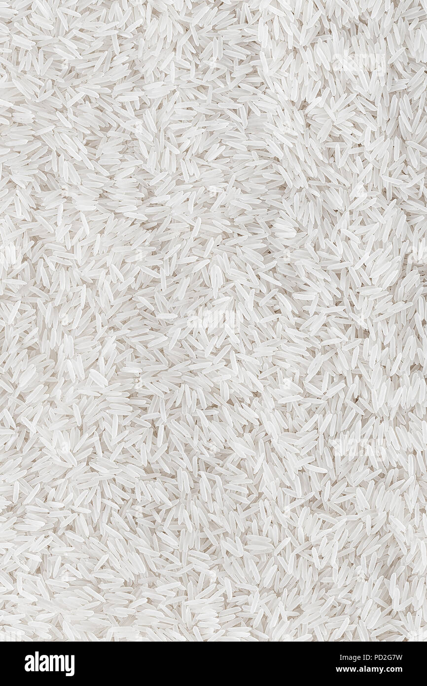 spilled crude basmati rice background, well some grain visible Stock ...
