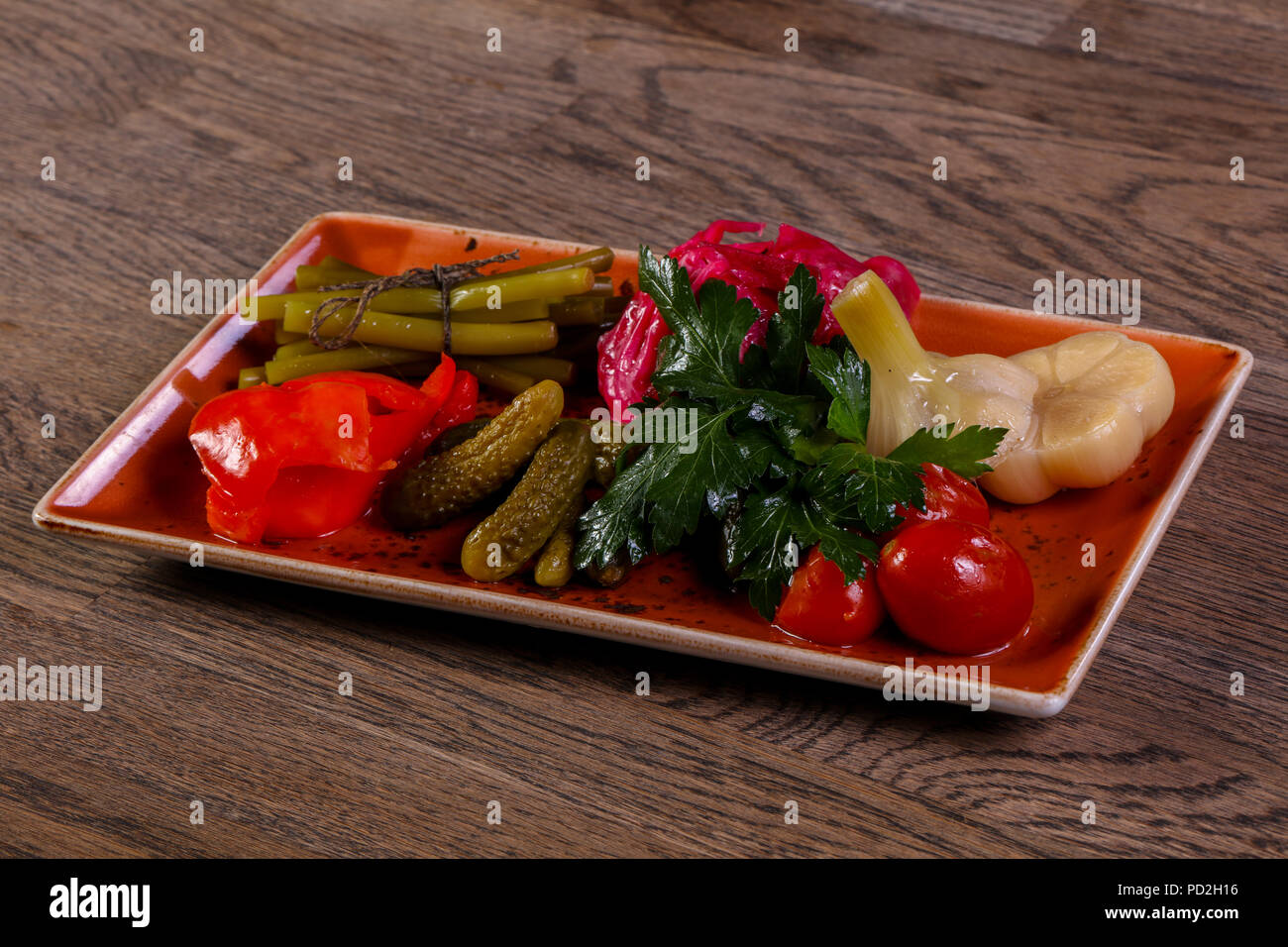 Pickled vegetables plate mix with parsley Stock Photo - Alamy