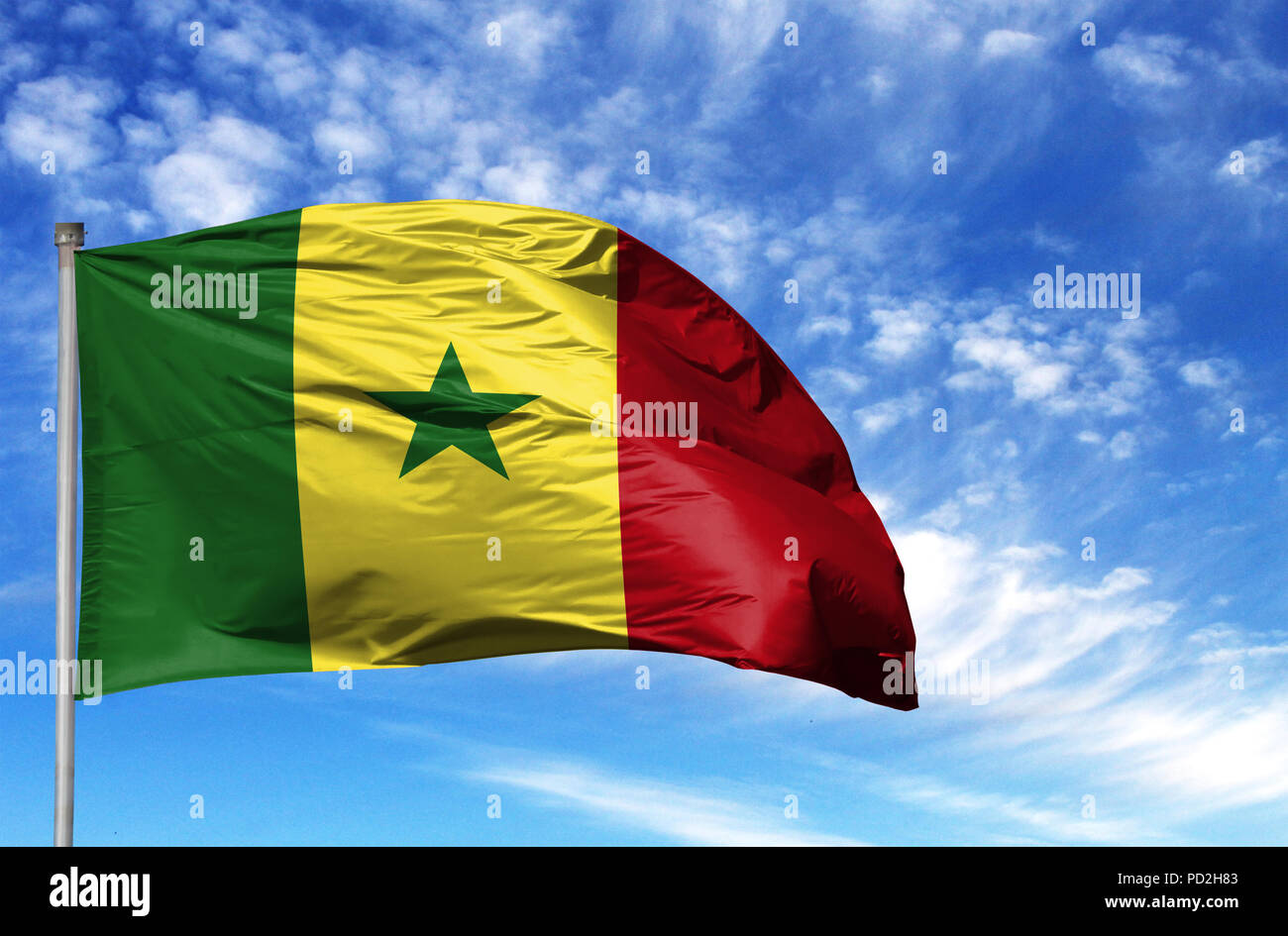 National flag of Senegal on a flagpole in front of blue sky Stock Photo ...
