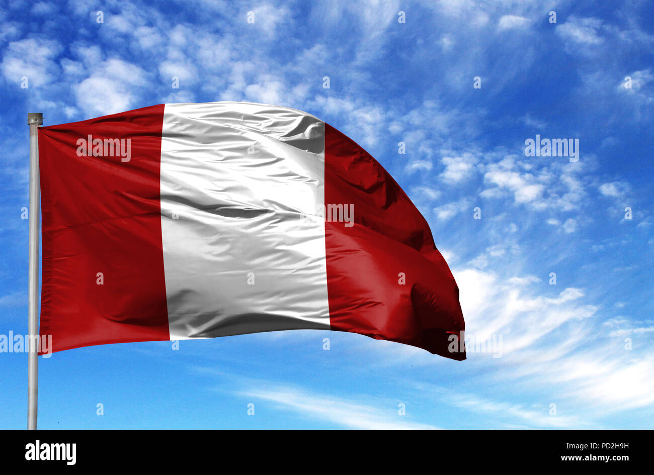 National flag of Peru on a flagpole in front of blue sky Stock Photo ...