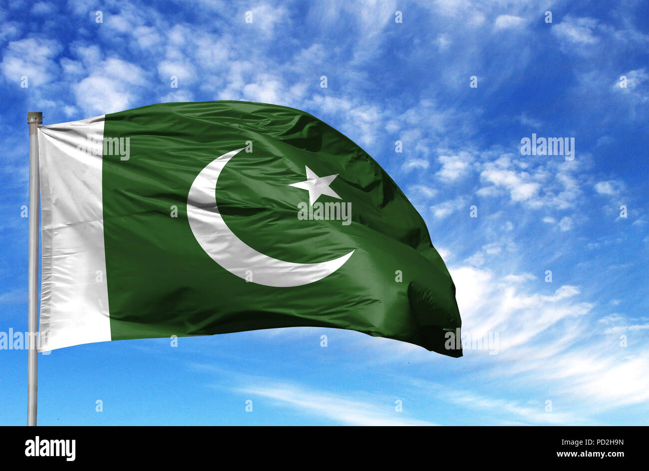 Pakistan flag on flag pole hi-res stock photography and images - Alamy