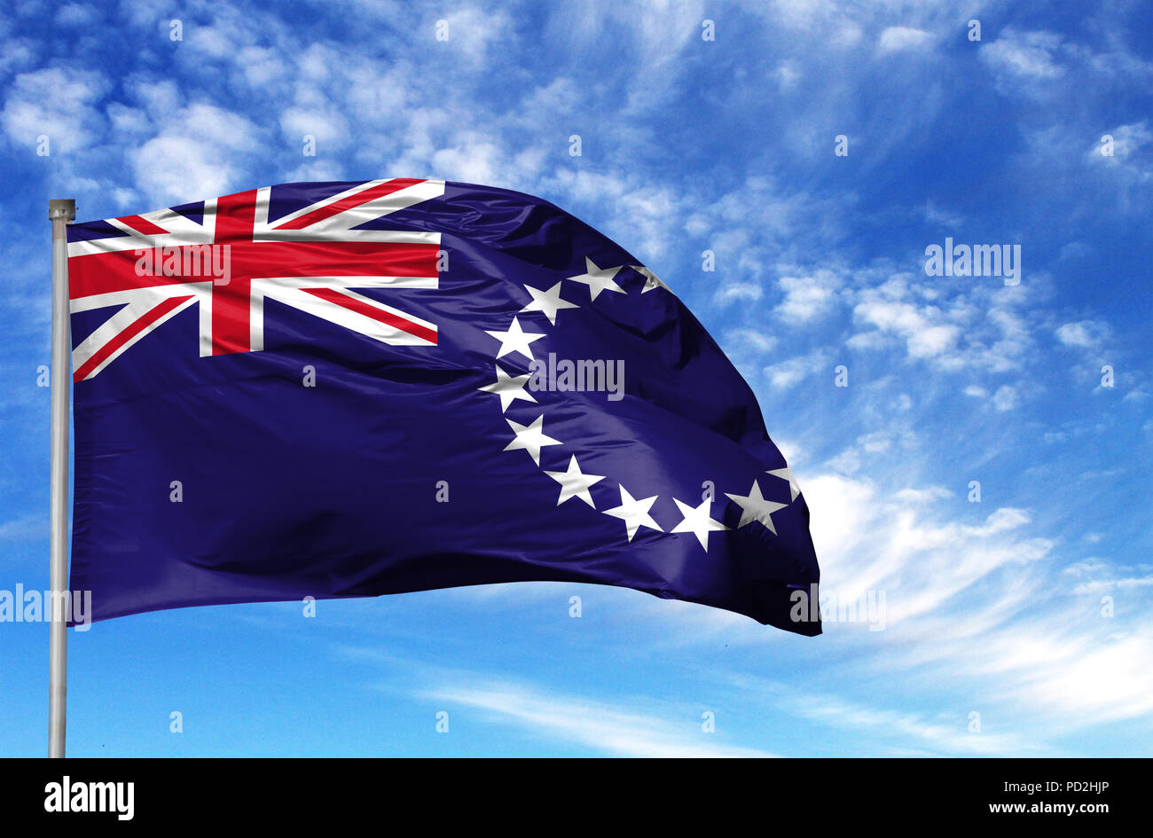 National flag of Cook Islands on a flagpole in front of blue sky Stock ...