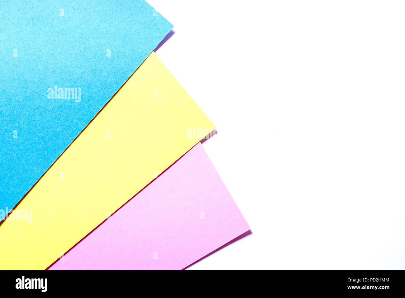 Blue, yellow and pink paper background Stock Photo - Alamy