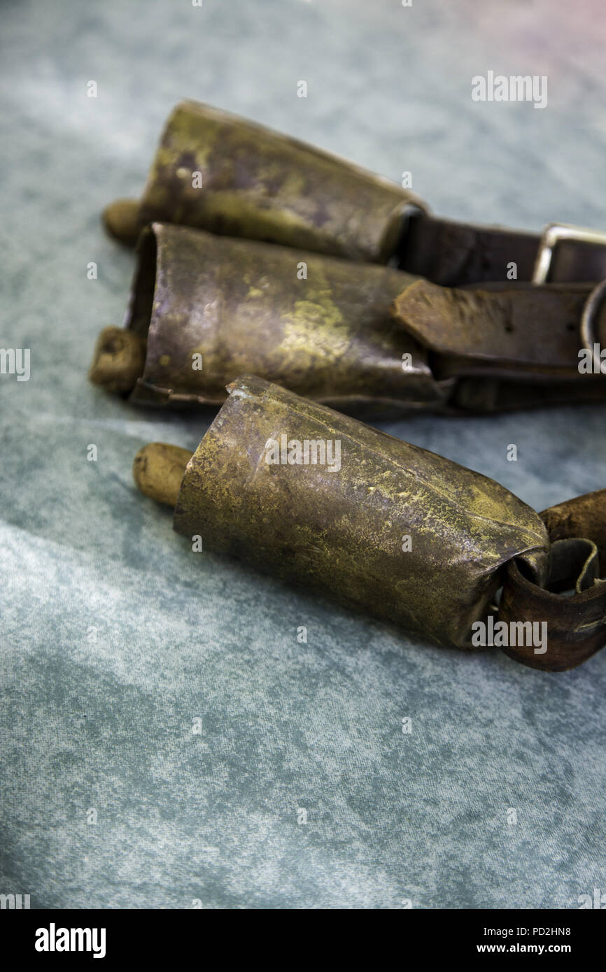 Antique cowbells for animals, signaling detail for cows Stock Photo - Alamy