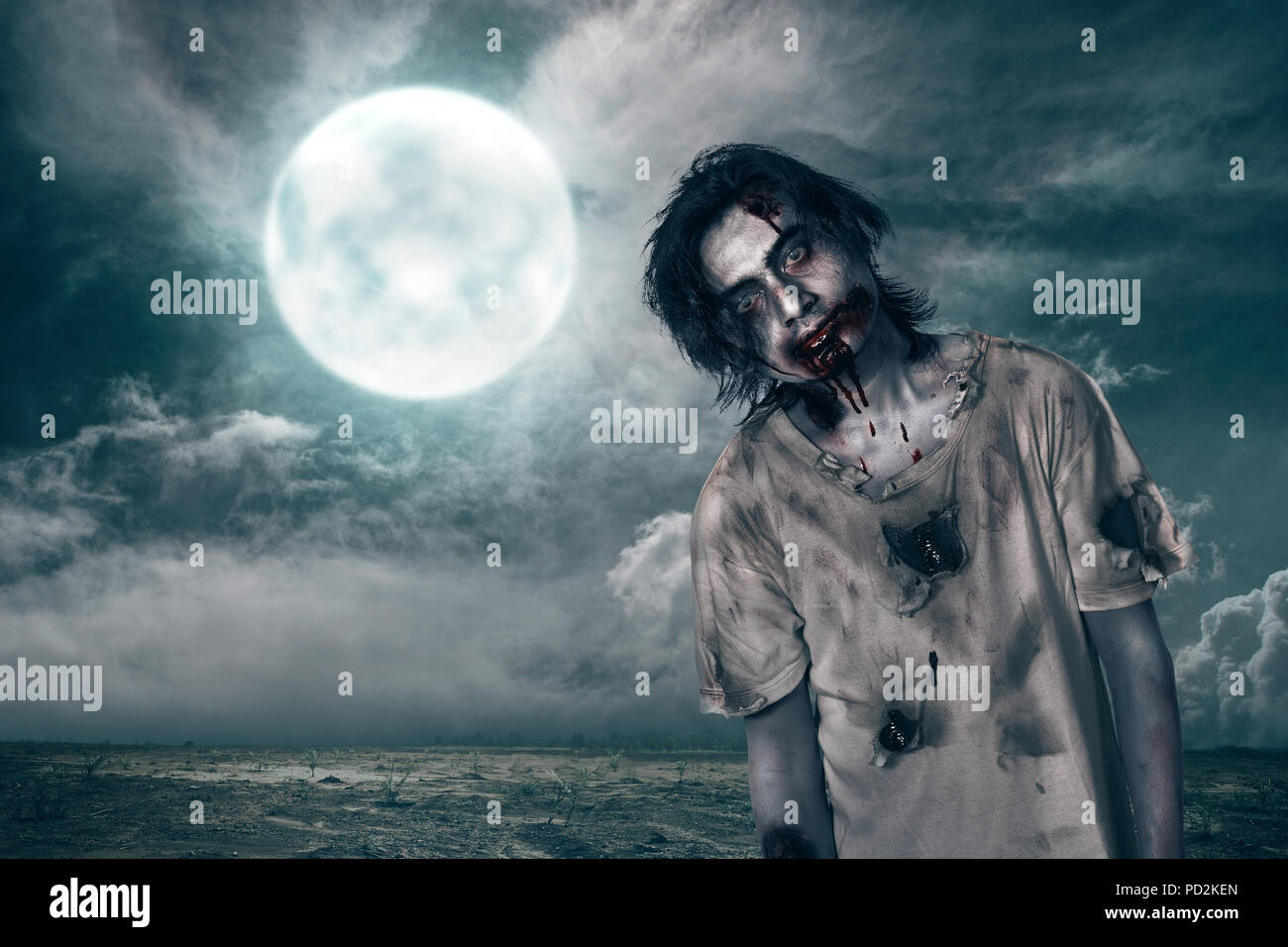 Creepy zombie man with blood on his mouth over moonlight background ...