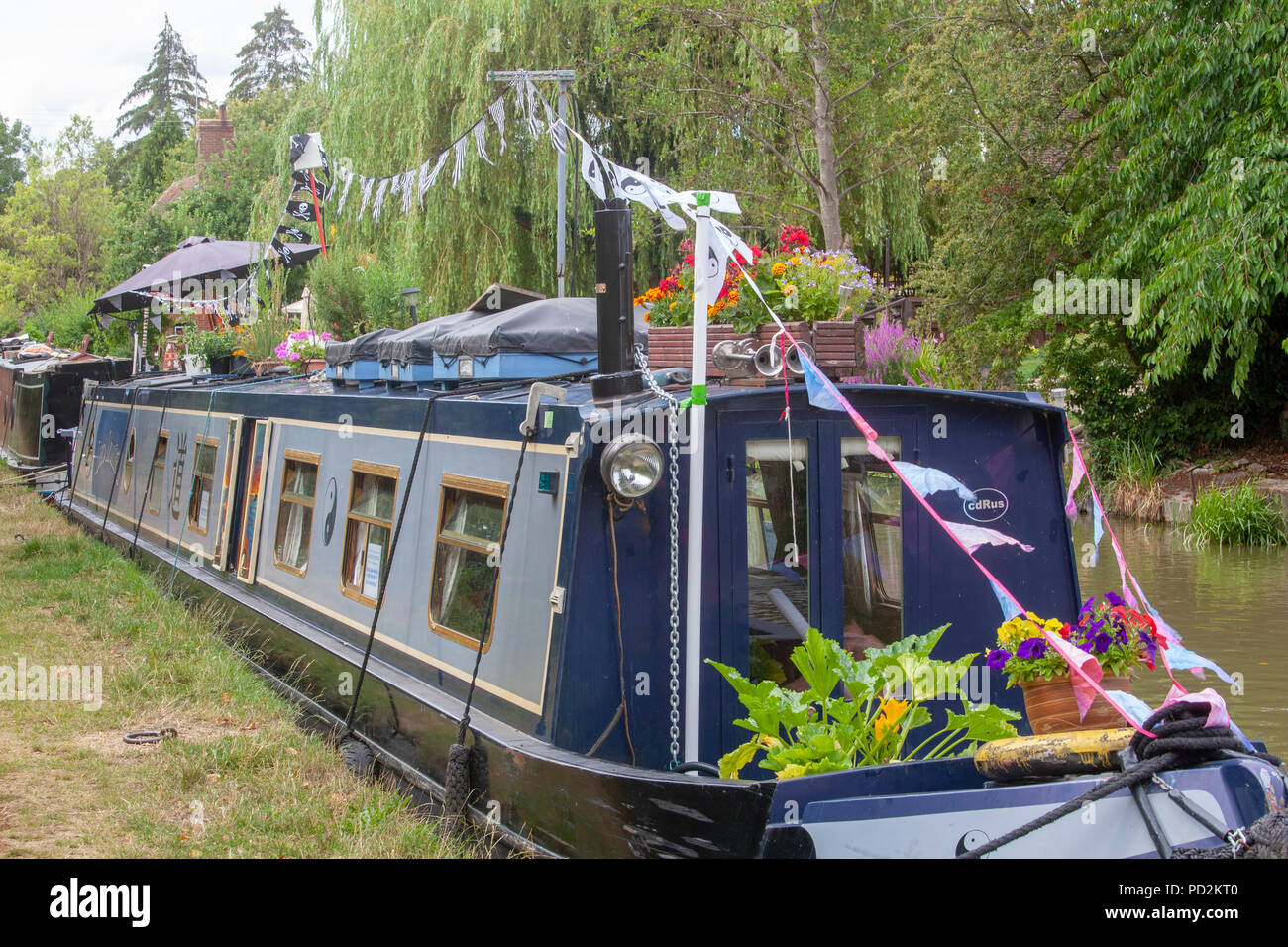 Narrowboat with bunting Stock Photo - Alamy