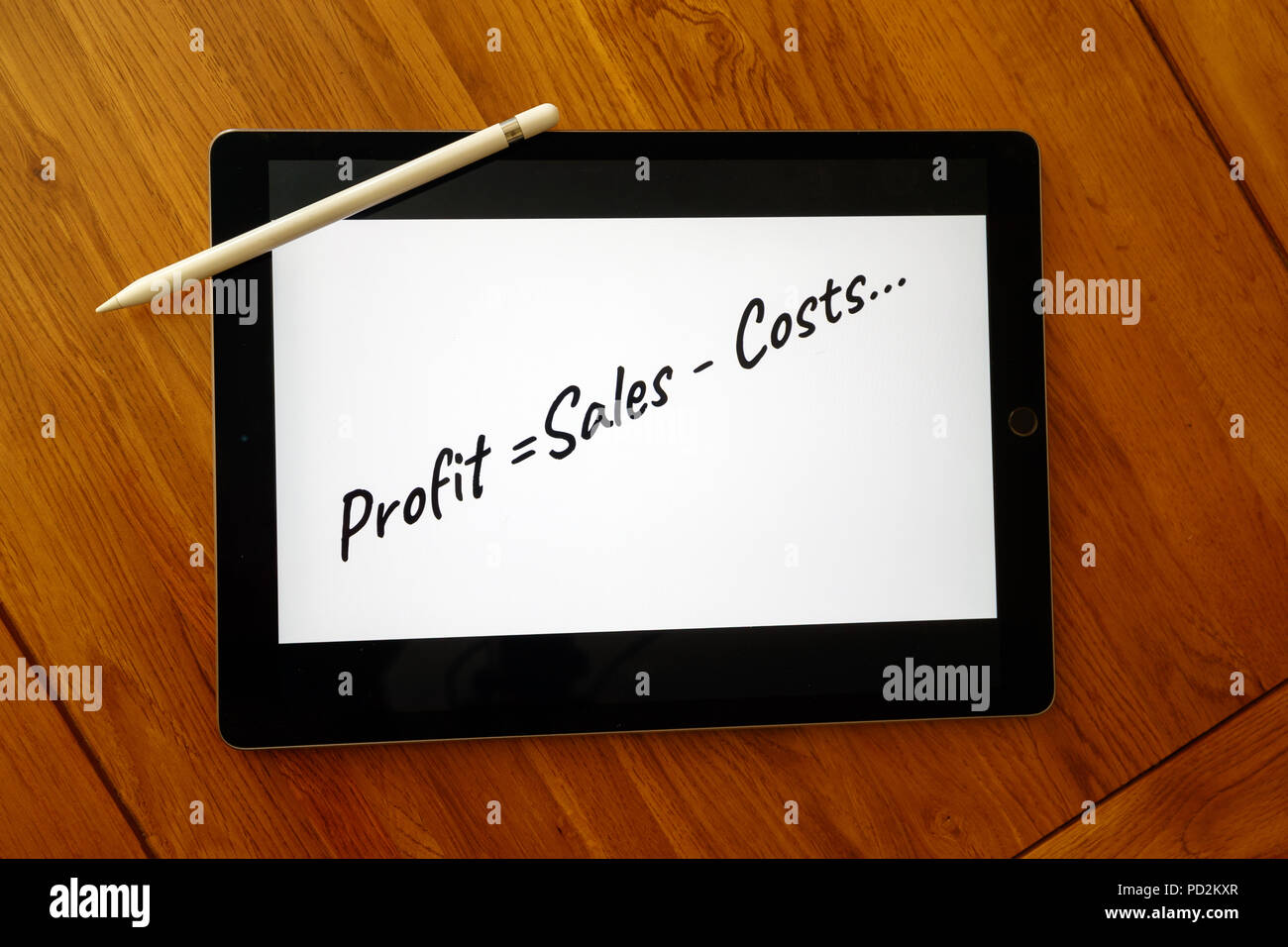 Business finance message, answer, formula written on a tablet with a ...