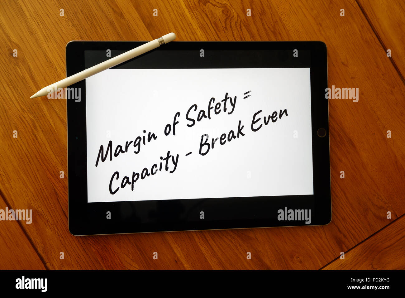 Business finance message, answer, formula written on a tablet with a ...