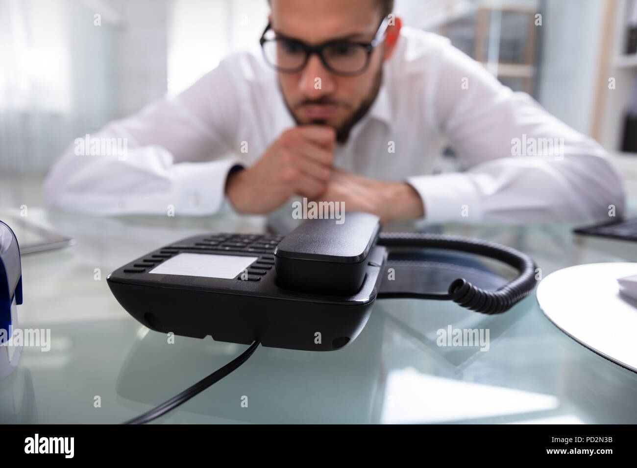 Man on telephone waiting landline hi-res stock photography and images ...