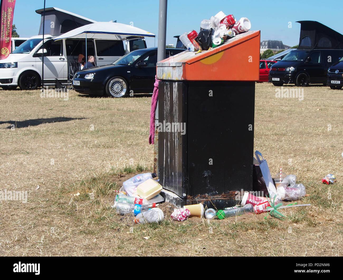 Overflowing dustbin hi-res stock photography and images - Alamy