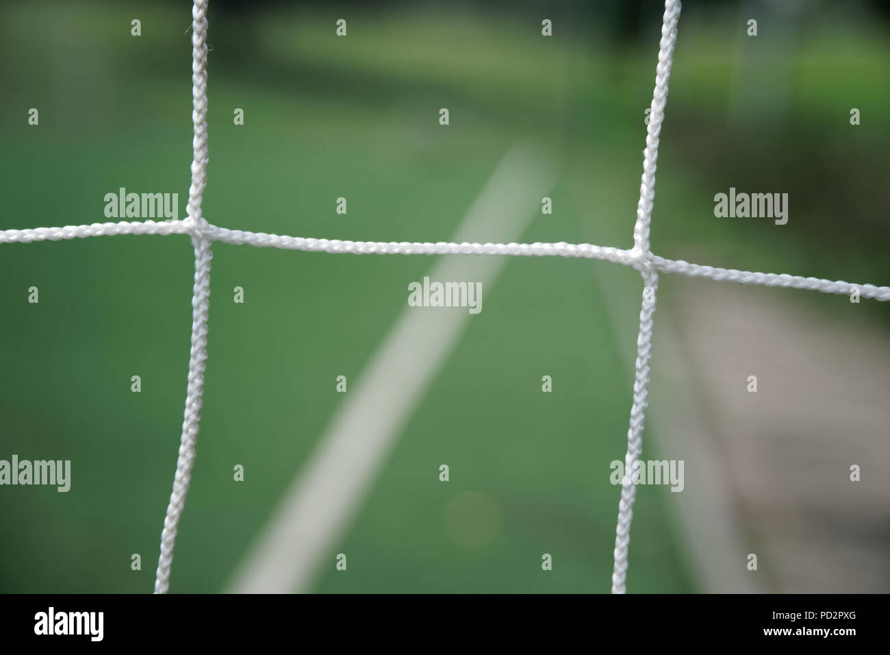 Soccer or football field with white net and square cell Stock Photo - Alamy