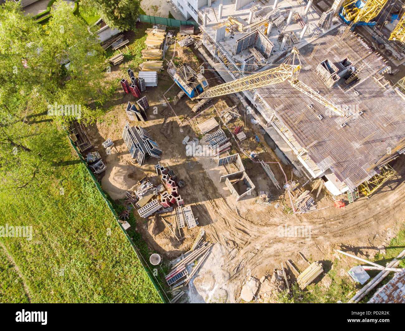 birds eye view of apartment building construction site in progress. civil residential area ...