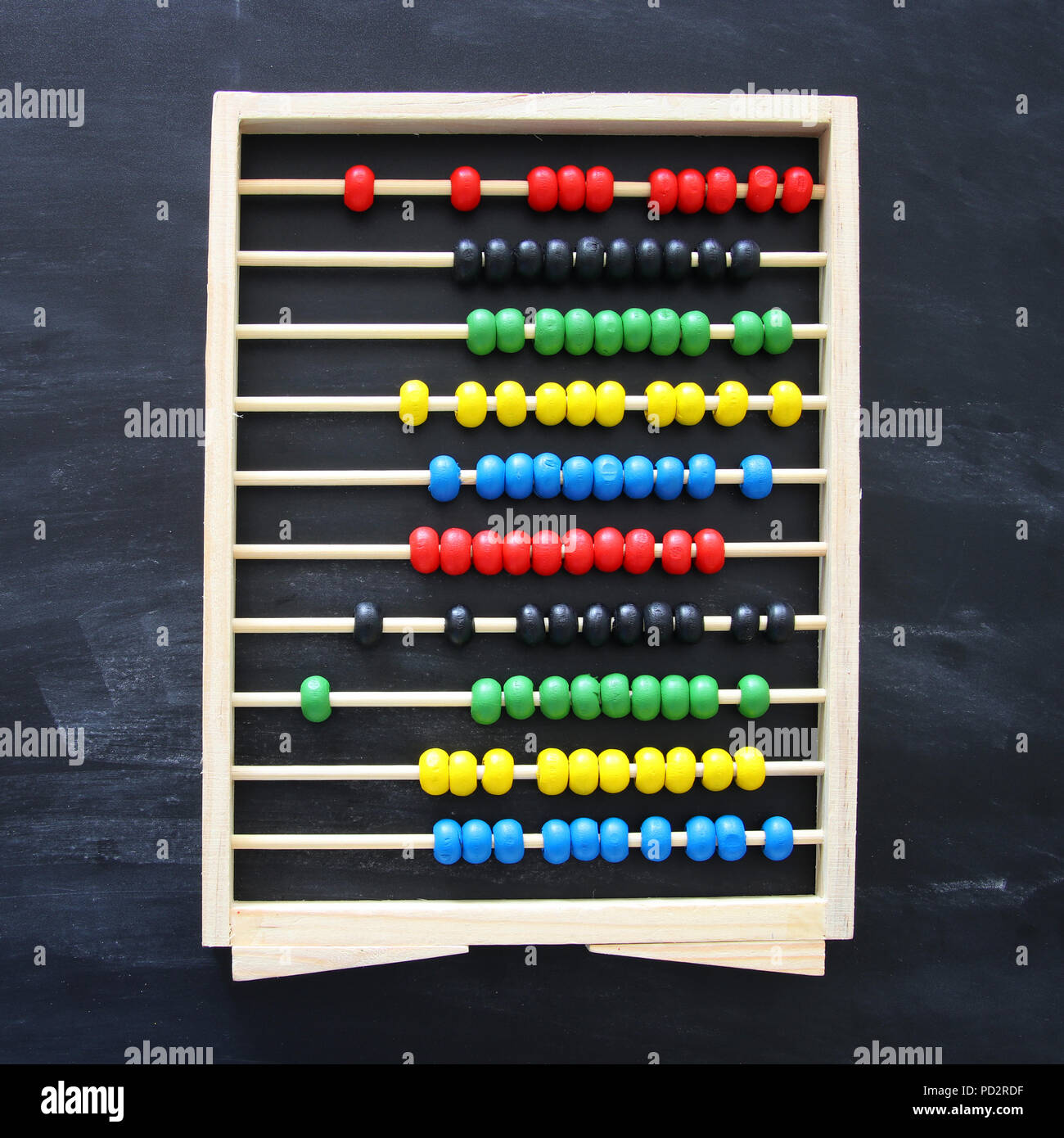 Top view of beaded Abacus over chalkboard background Stock Photo - Alamy